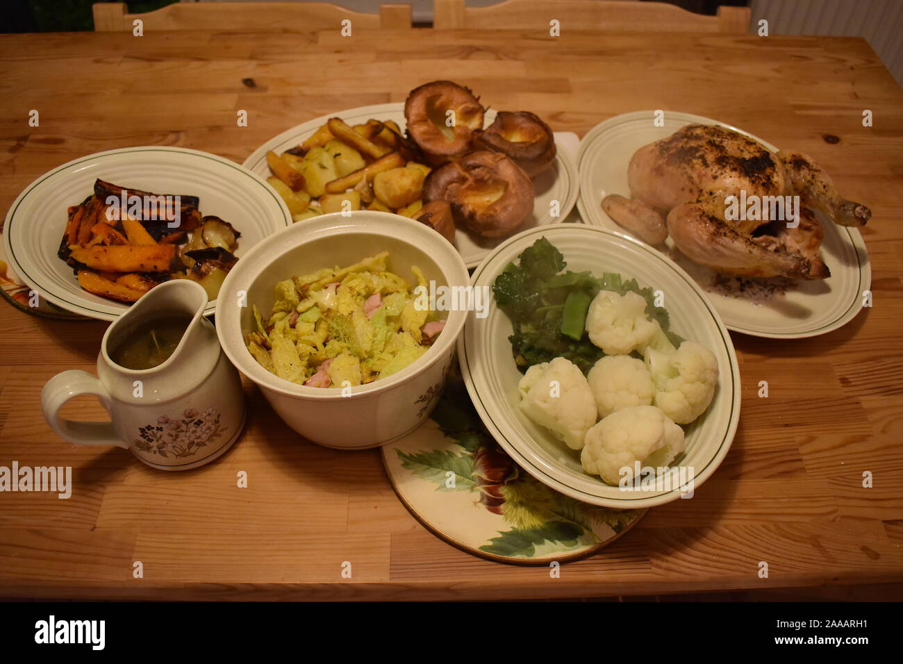 Traditional Sunday roast chicken,Yorkshire puddings,vegetables ...
