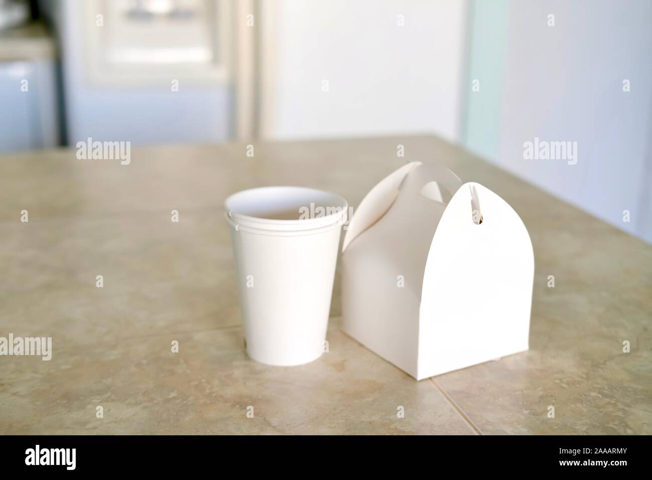 White paper cups and box Stock Photo - Alamy