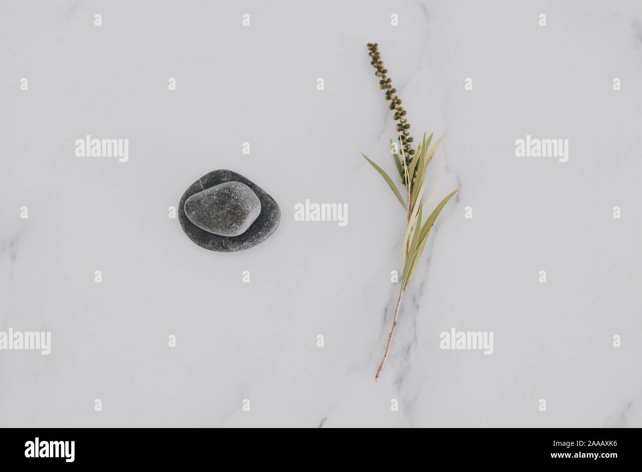 minimalist calming visuals conceptual still-life, stacked pebbles with ...