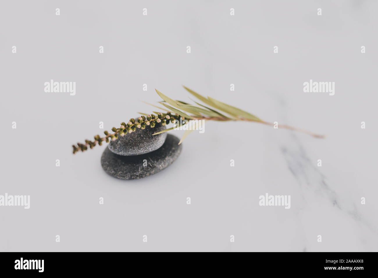 minimalist calming visuals conceptual still-life, stacked pebbles with ...