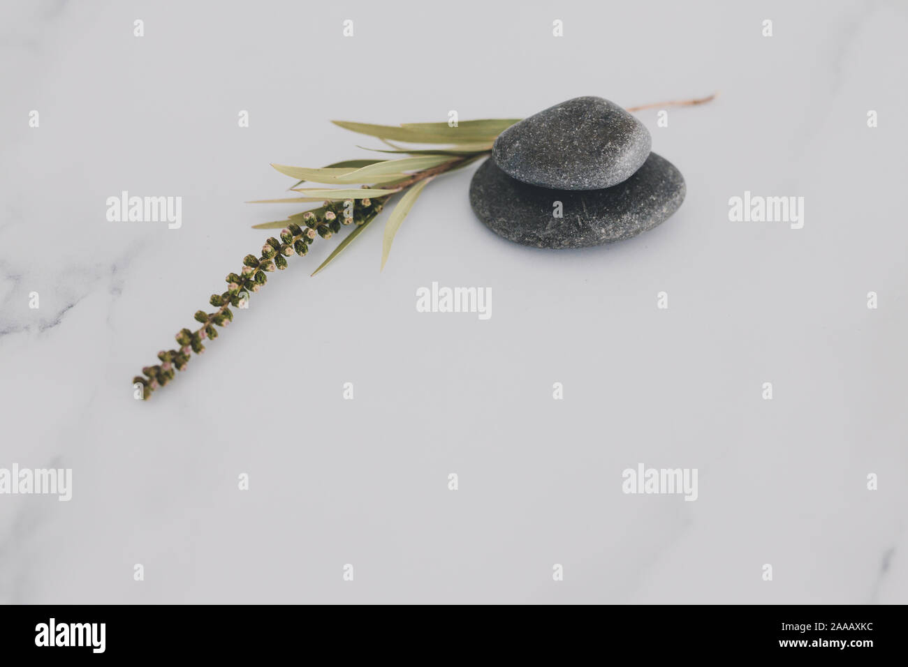 minimalist calming visuals conceptual still-life, stacked pebbles with ...