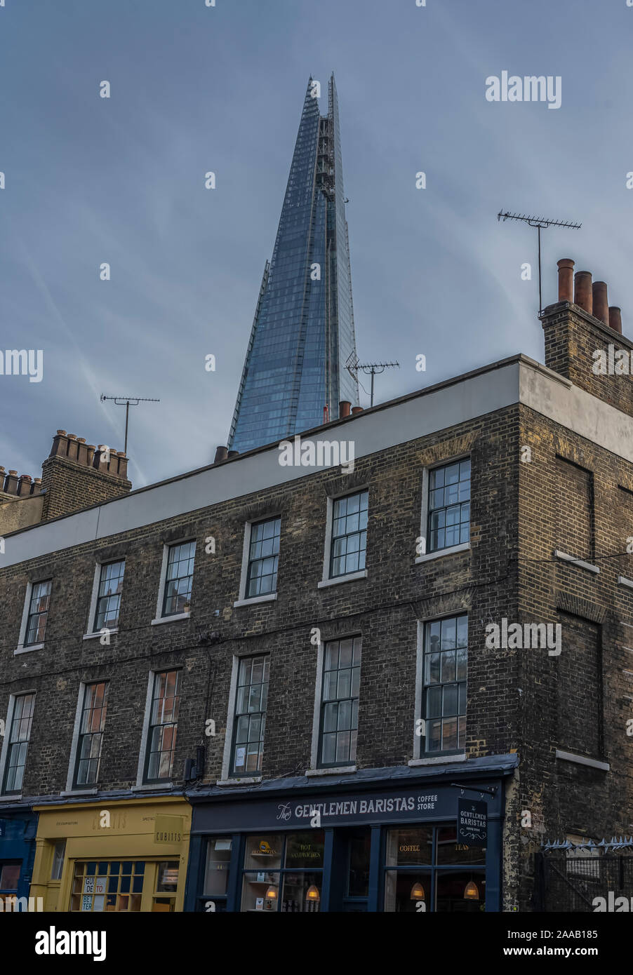 Old Building with the modern Shard building behind it Stock Photo - Alamy