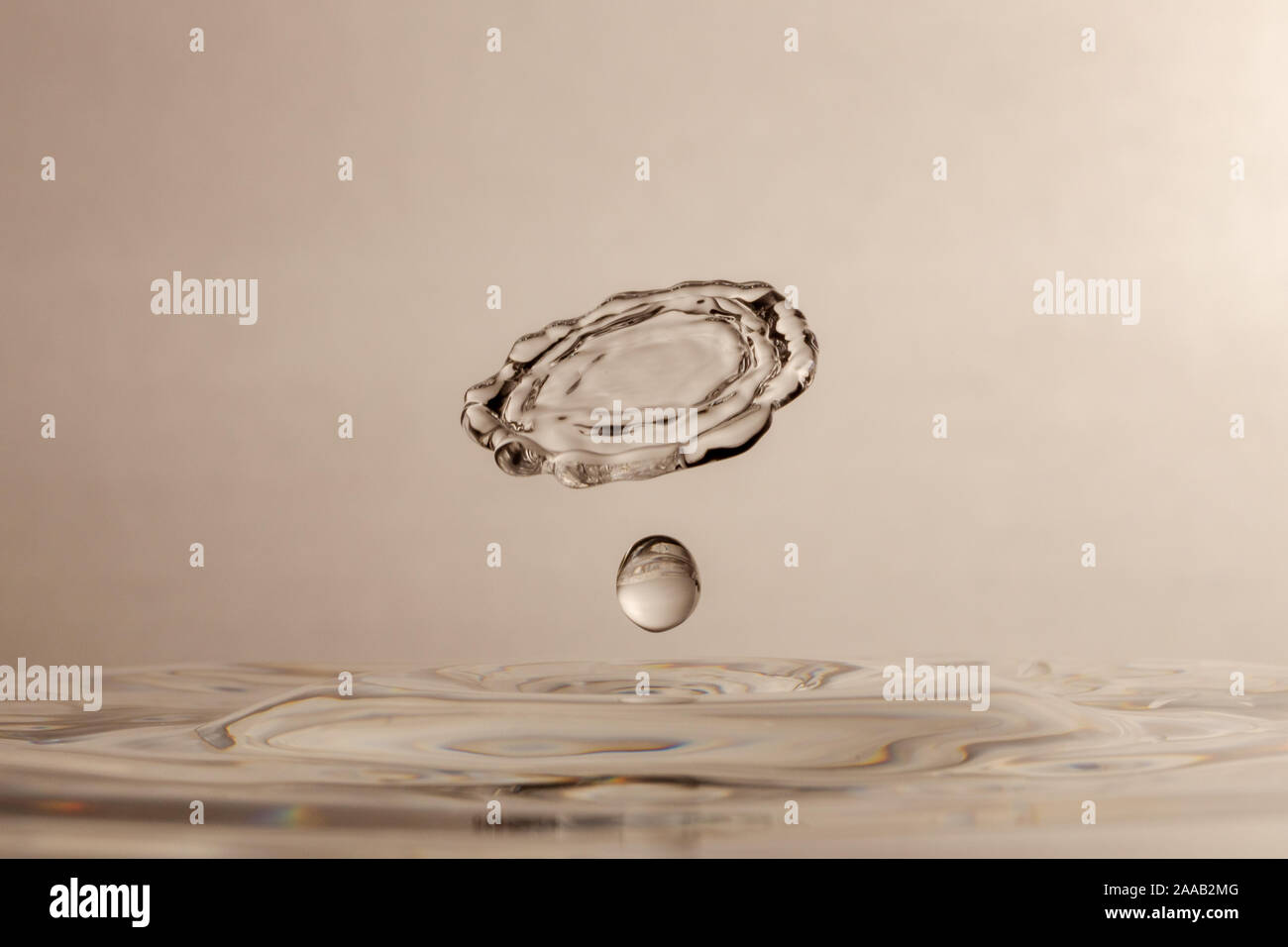 Water droplet bouncing hi-res stock photography and images - Alamy
