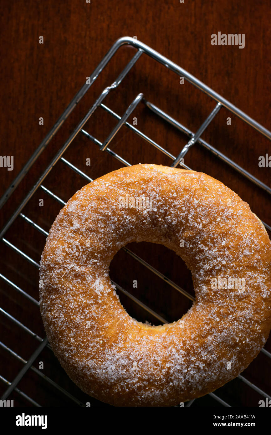 Doughnut on a cooling rack Stock Photo - Alamy
