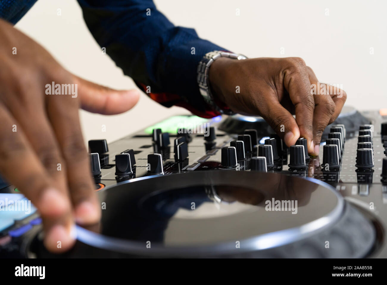 Dj mixes the track in the nightclub at party Stock Photo - Alamy