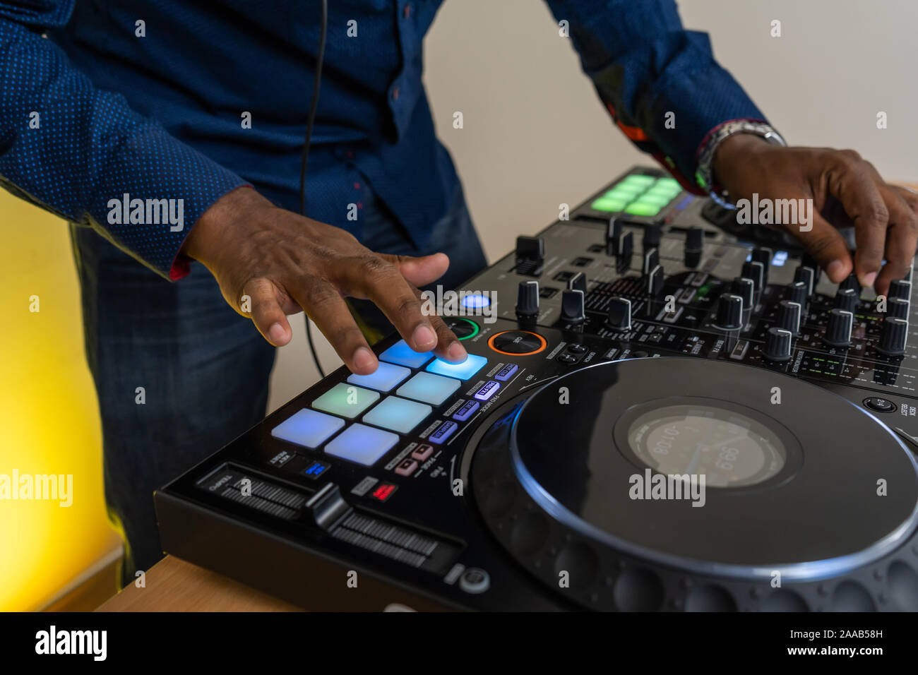 Dj mixes the track in the nightclub at party Stock Photo - Alamy