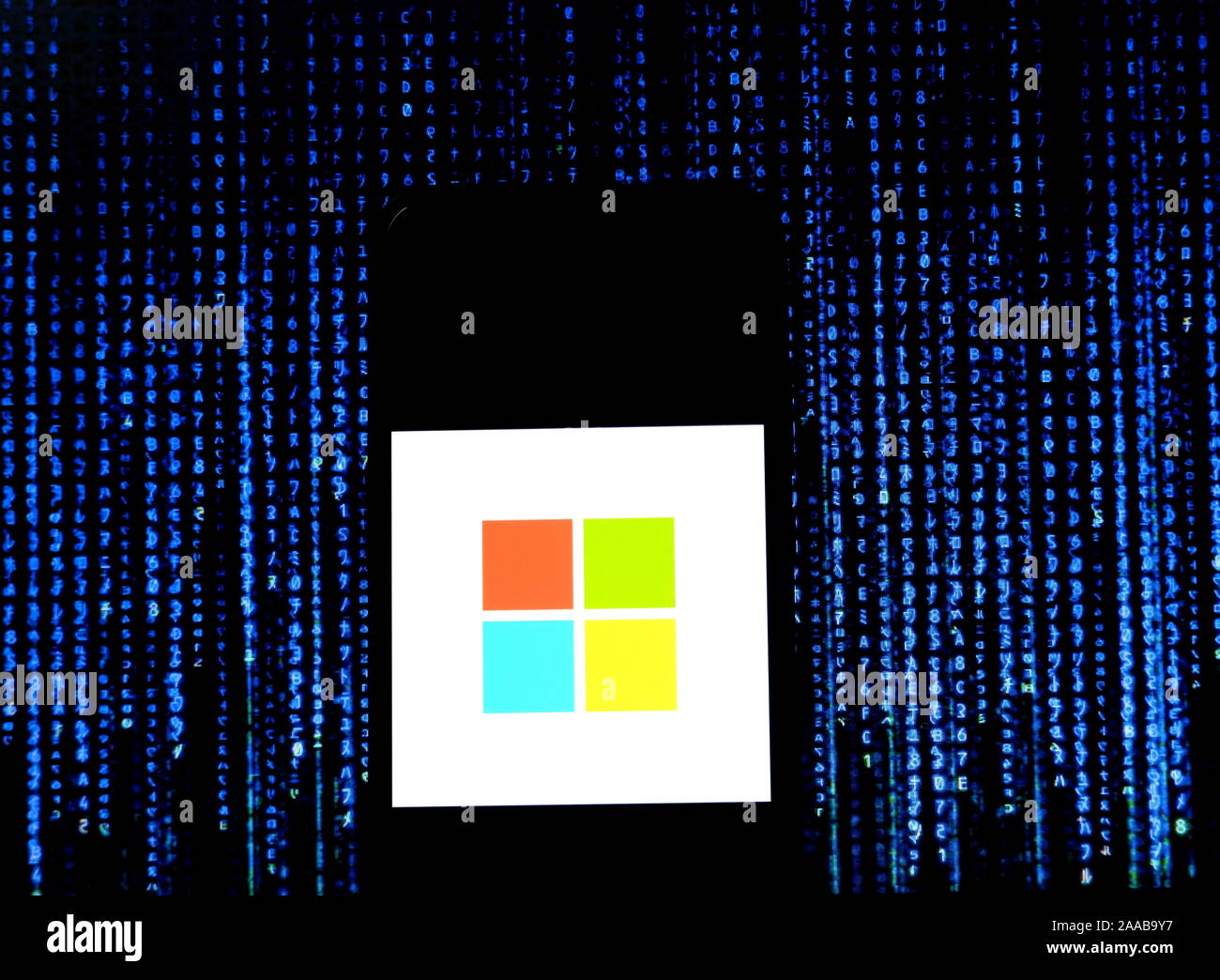 In this photo illustration a Microsoft logo seen displayed on a ...