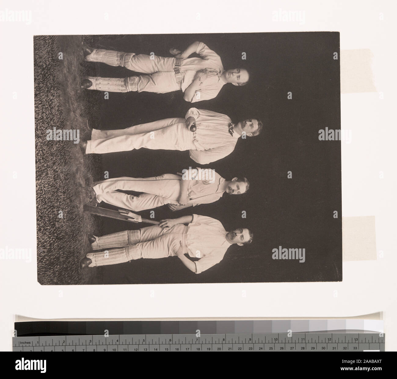 Cricket players, Unidentified group of four; Cricket players ...