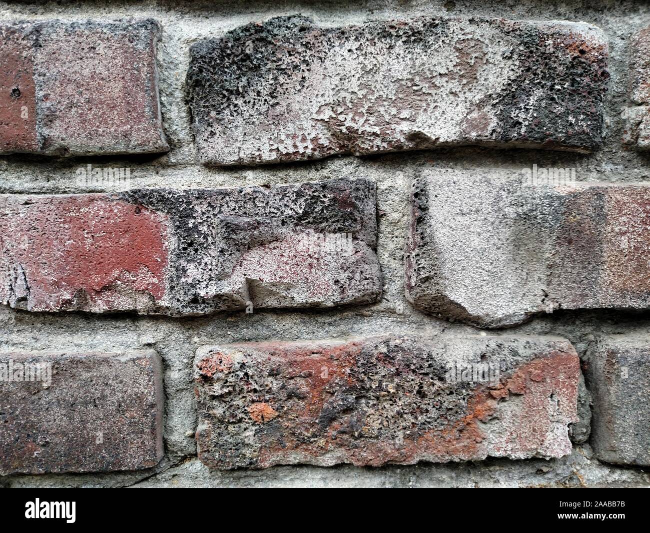 Exterior brick wall made of clinker bricks salvaged from collapsed ...