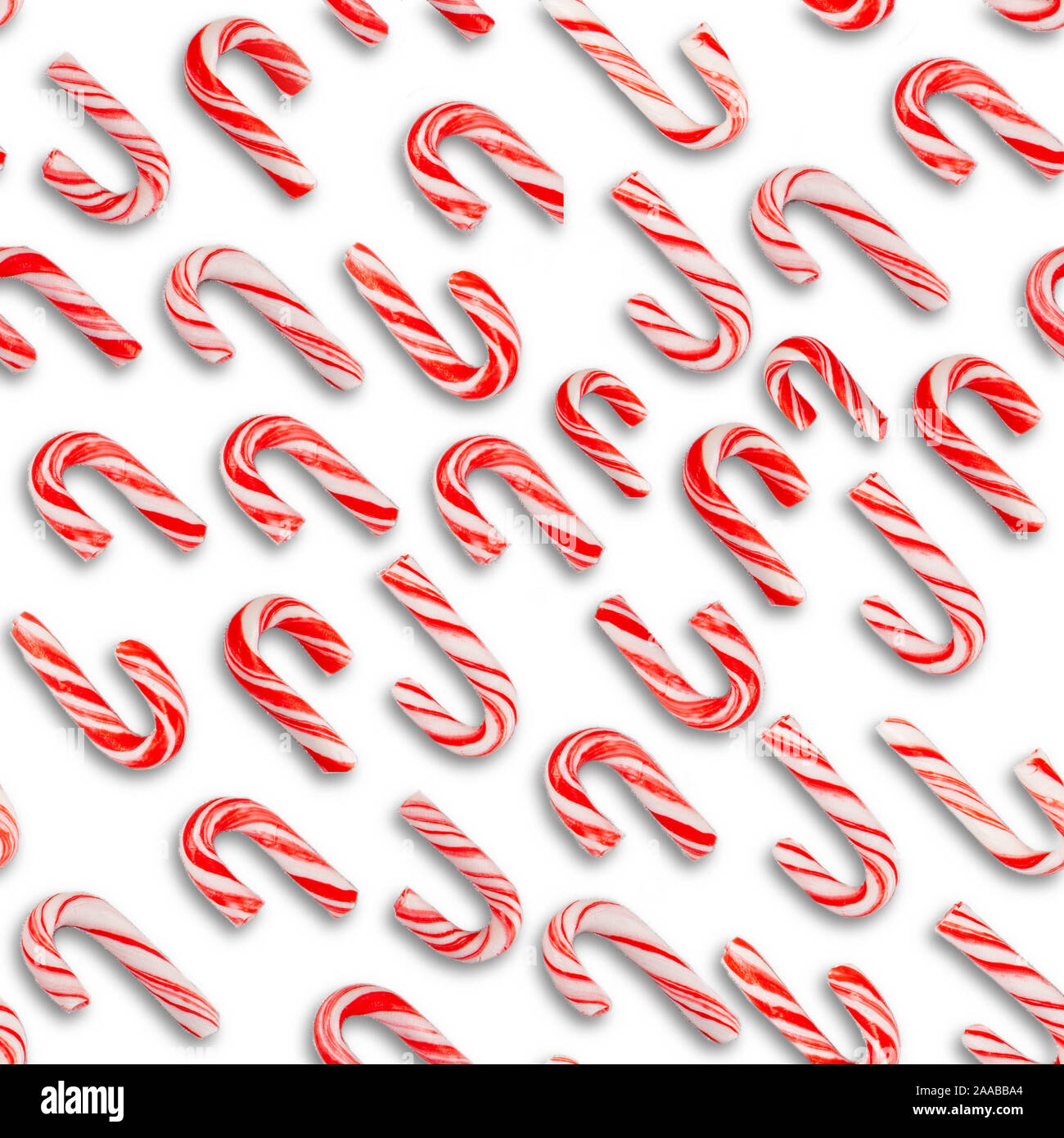 Candy canes on white background - seamless pattern Stock Photo - Alamy