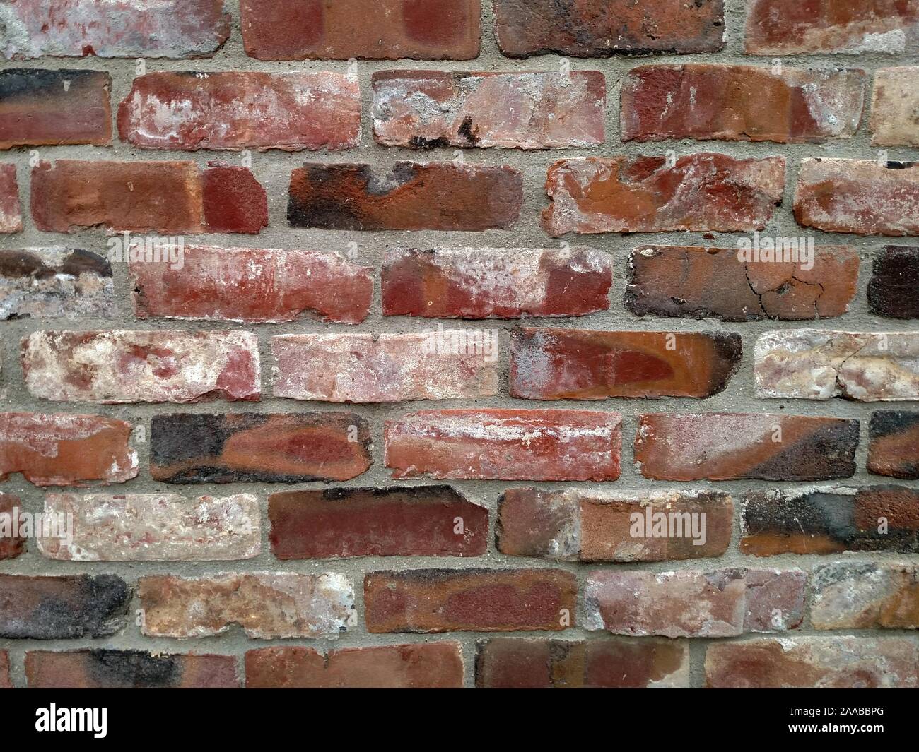Exterior brick wall made of clinker bricks salvaged from collapsed ...