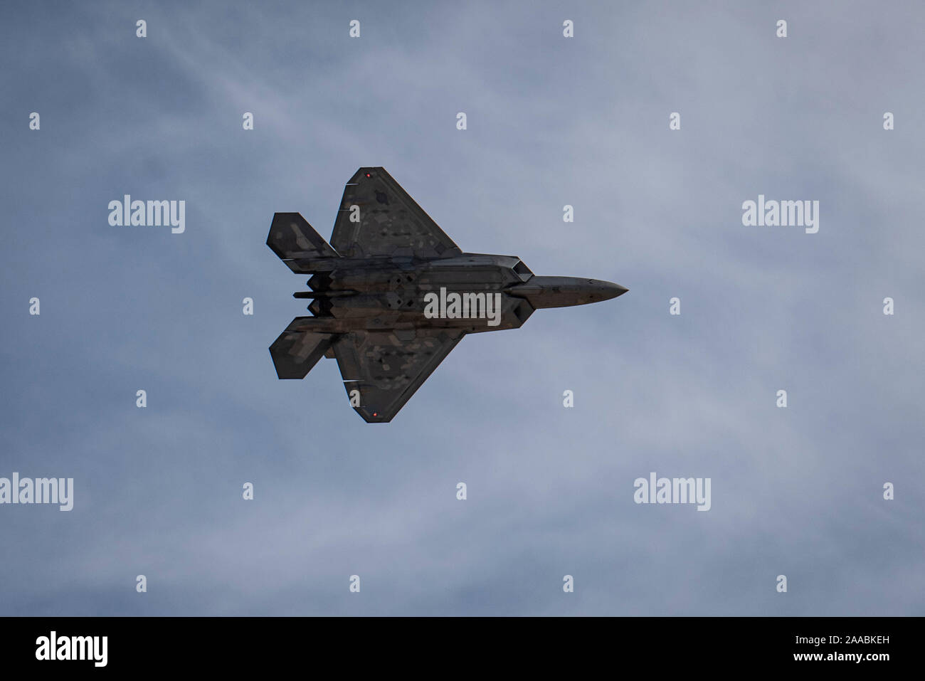 An F-22 Raptor fighter jet assigned to the 433rd Weapons Squadron ...