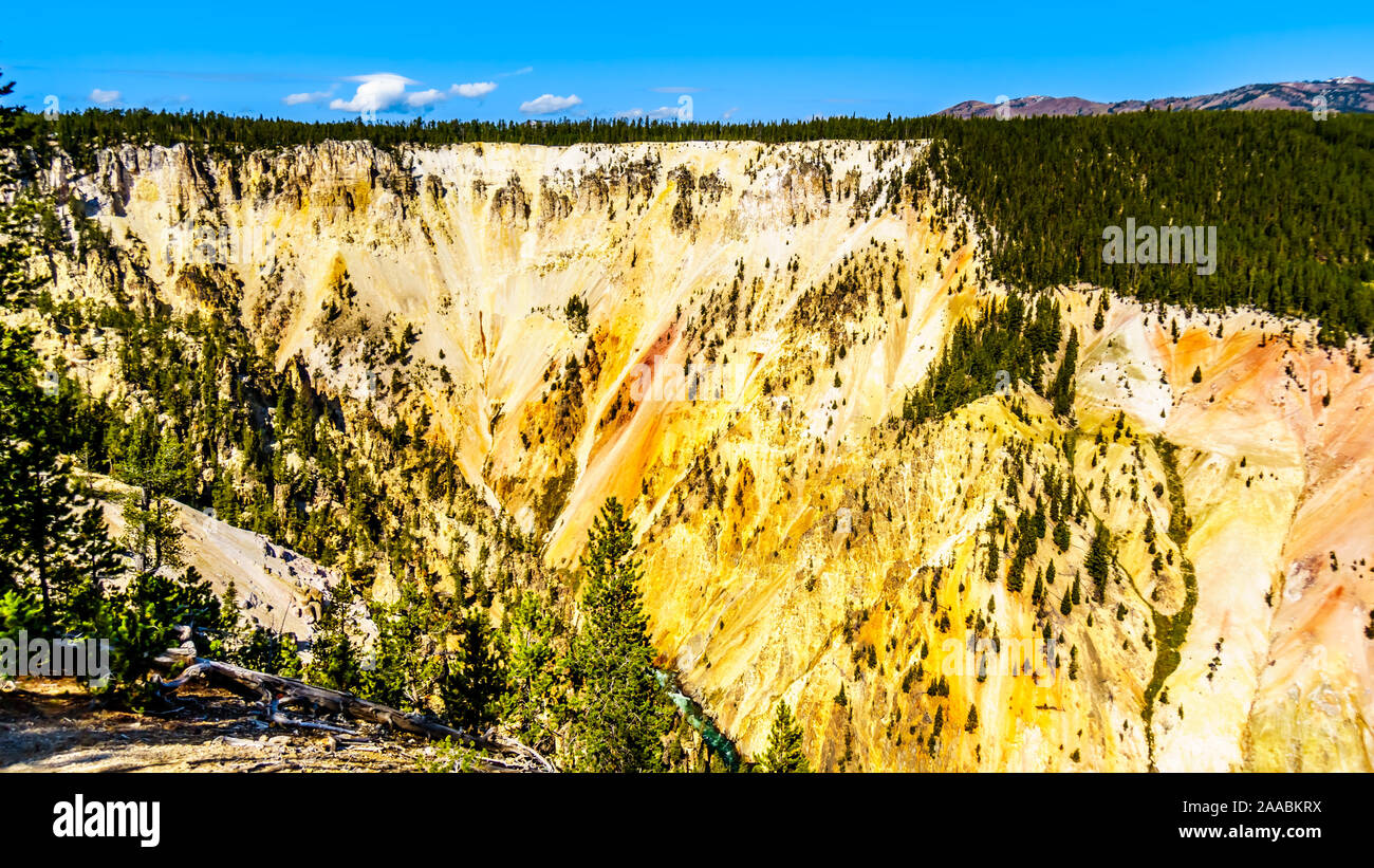 The yellow and orange sandstone walls of the cliffs of the Grand Canyon ...