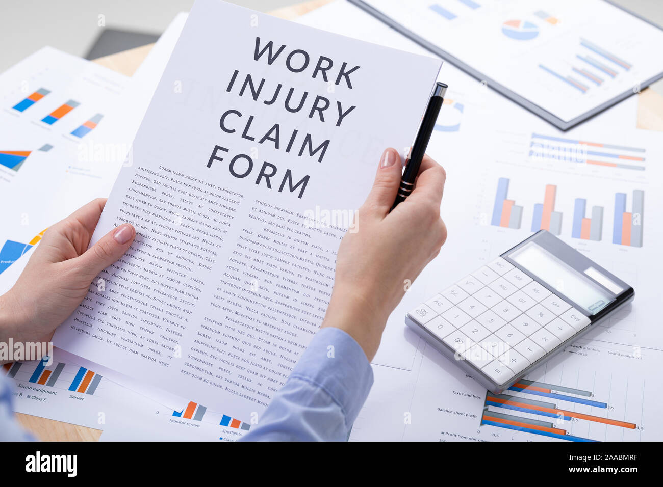 work injury claim form concept, documents on the desktop Stock Photo ...