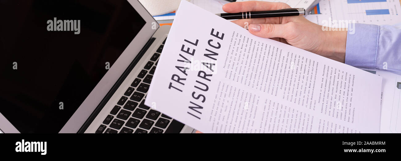 travel insurance concept, documents on the desktop Stock Photo - Alamy