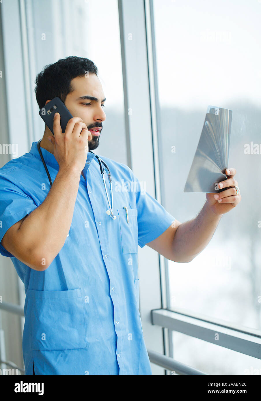 Group of medical workers working together in hospital Stock Photo - Alamy