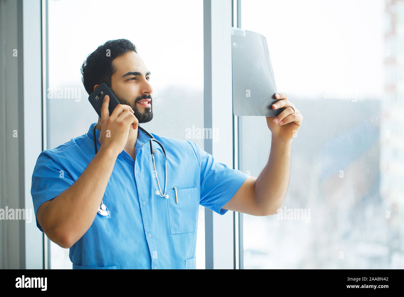 Group of medical workers working together in hospital Stock Photo - Alamy