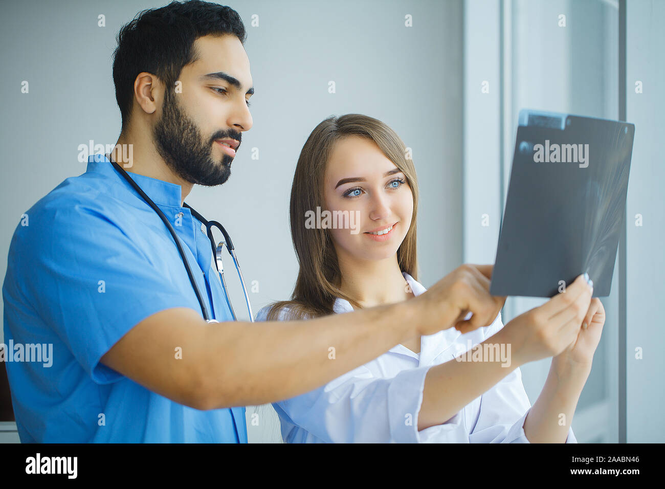 Group of medical workers working together in hospital Stock Photo - Alamy