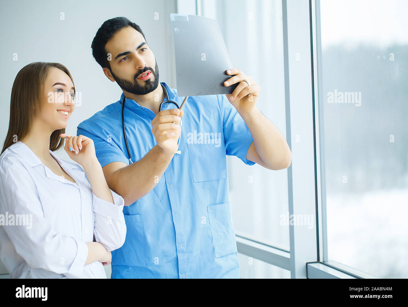 Group of medical workers working together in hospital Stock Photo - Alamy