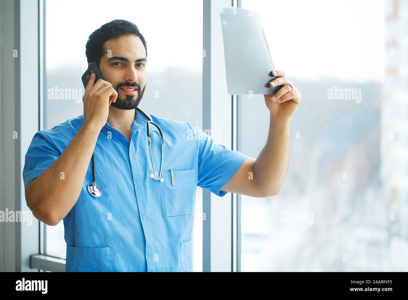 Group of medical workers working together in hospital Stock Photo - Alamy