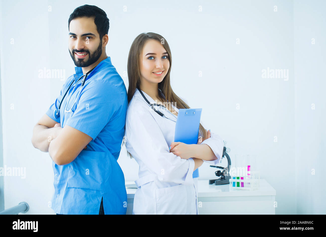 Group of medical workers working together in hospital Stock Photo - Alamy