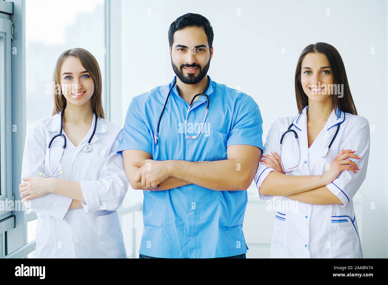 Group of medical workers working together in hospital Stock Photo - Alamy