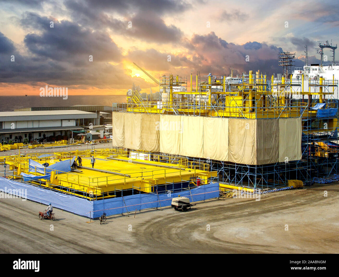 Offshore oil rig platform during construction site in the harbor yard ...