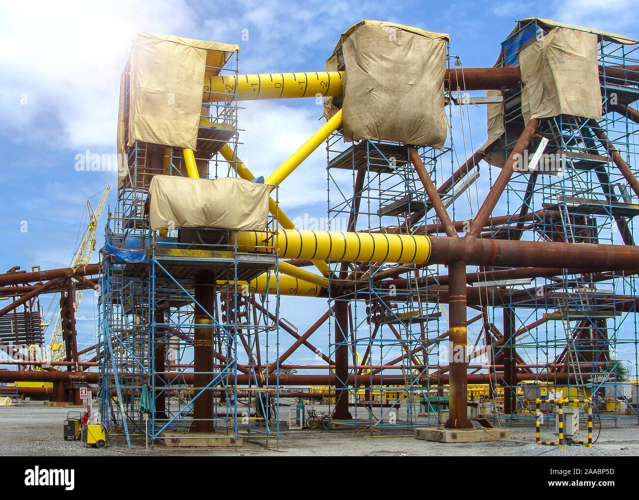 Oil rig platform during construction site in the harbor yard and ...