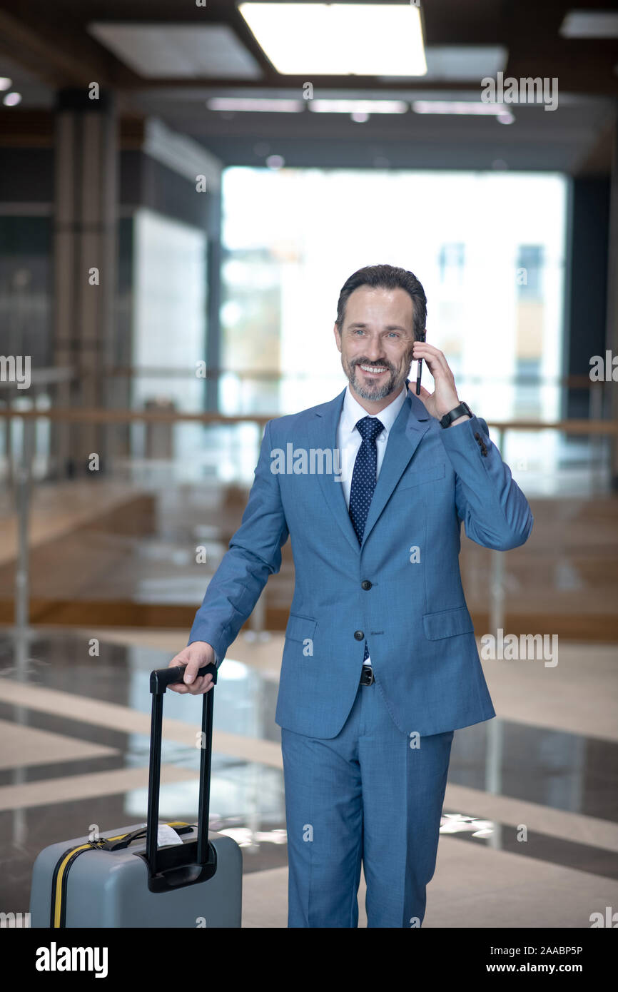 Mature adult businessman coming office hi-res stock photography and ...