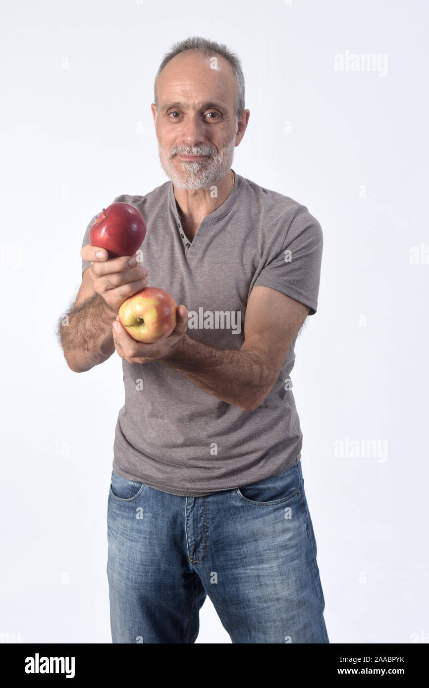 man with Apple on white background Stock Photo - Alamy