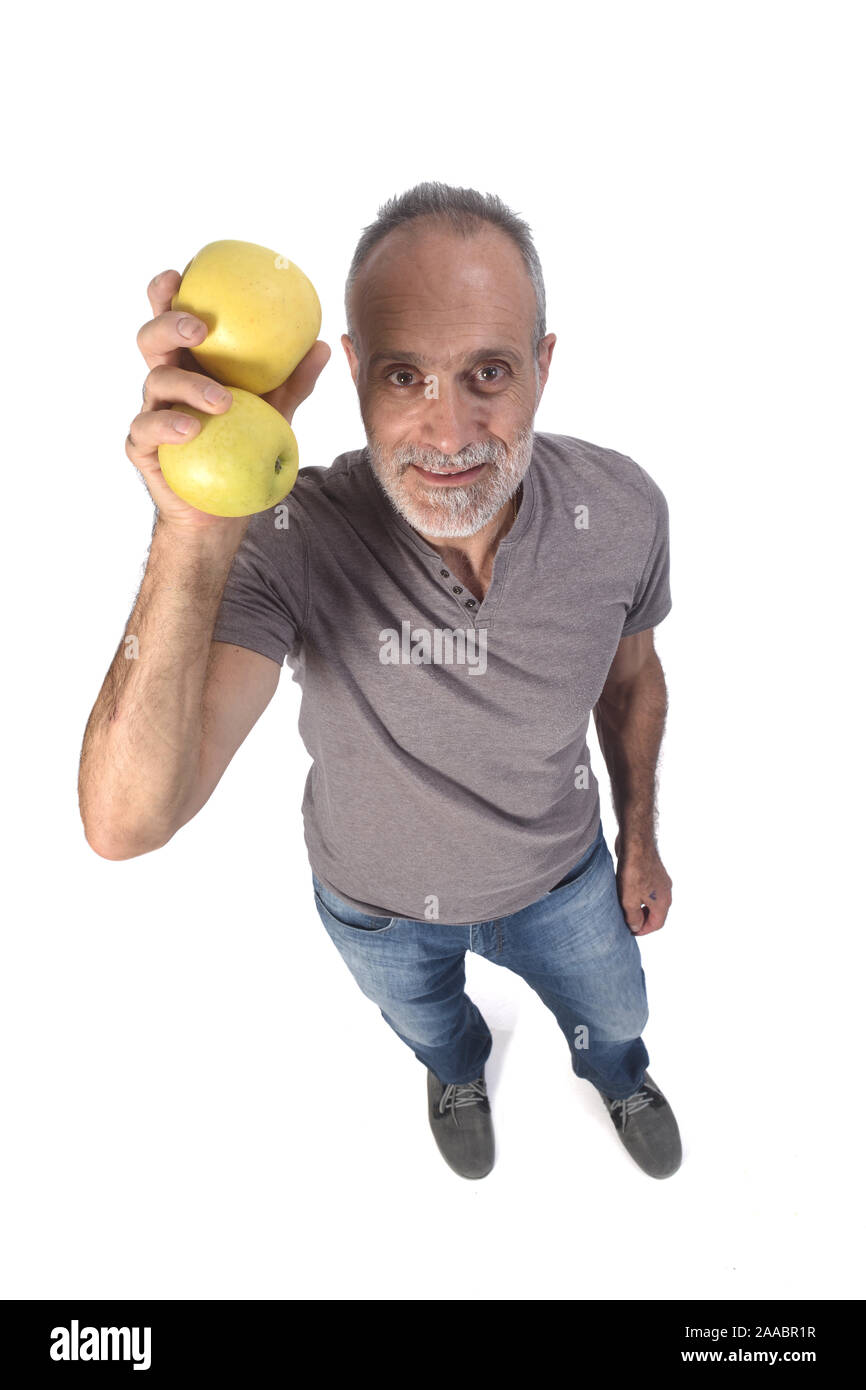 man with apple on white background Stock Photo - Alamy