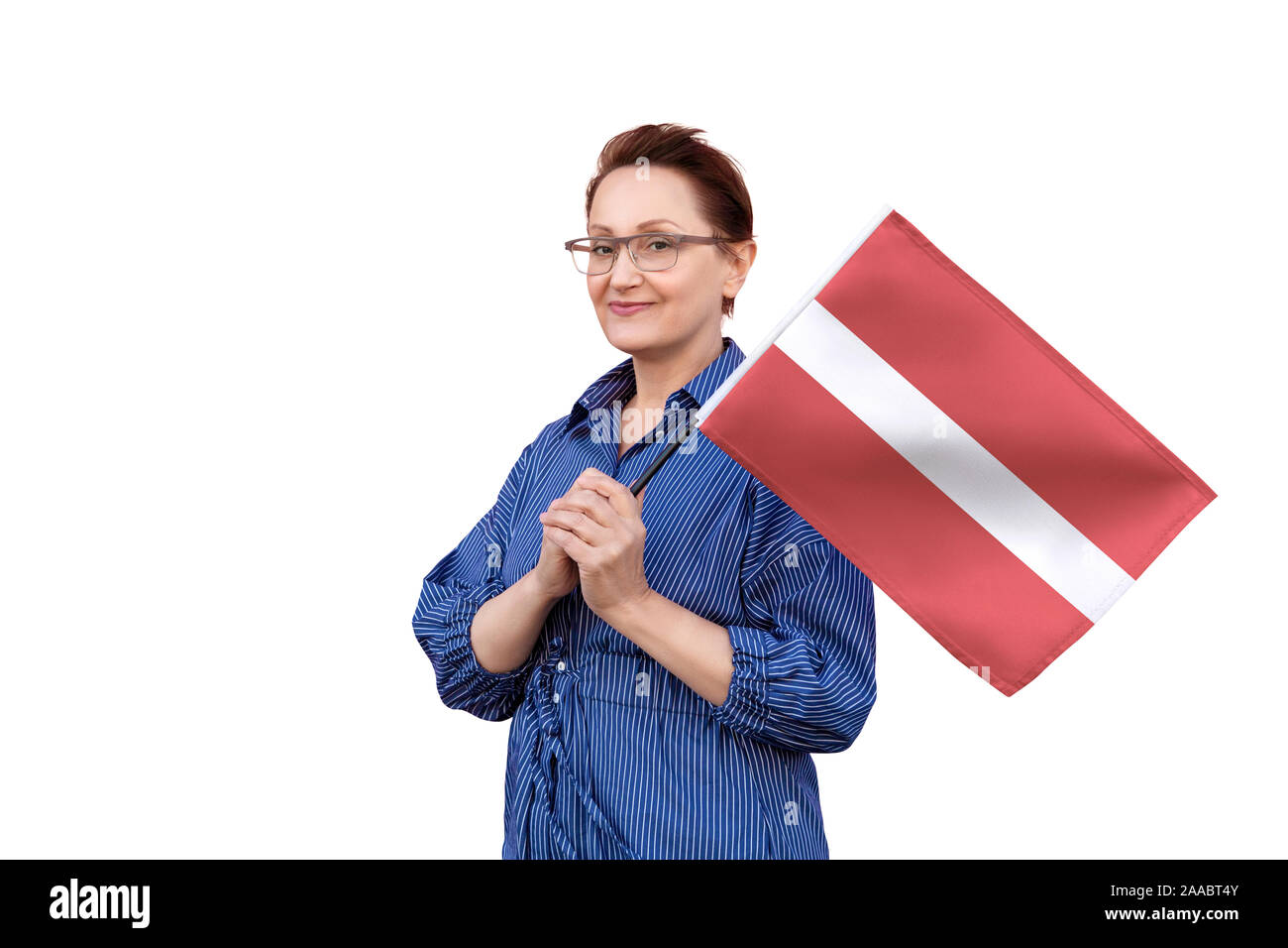 Latvia flag. Woman holding Latvian flag. Nice portrait of middle aged lady 40 50 years old ...