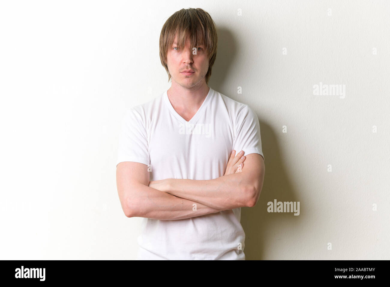 Man crossing his arms hi-res stock photography and images - Alamy