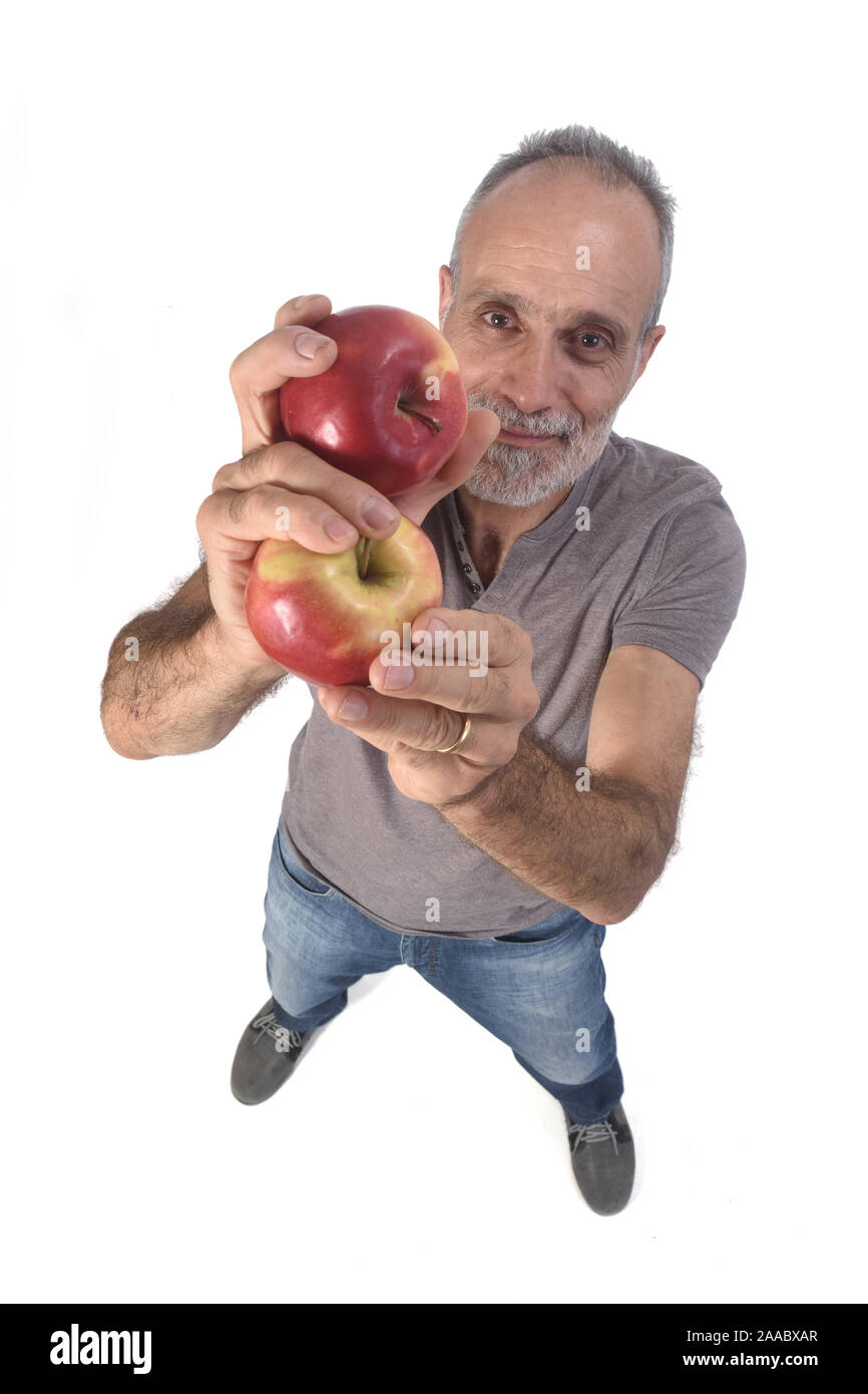 man with red apple on white background Stock Photo - Alamy