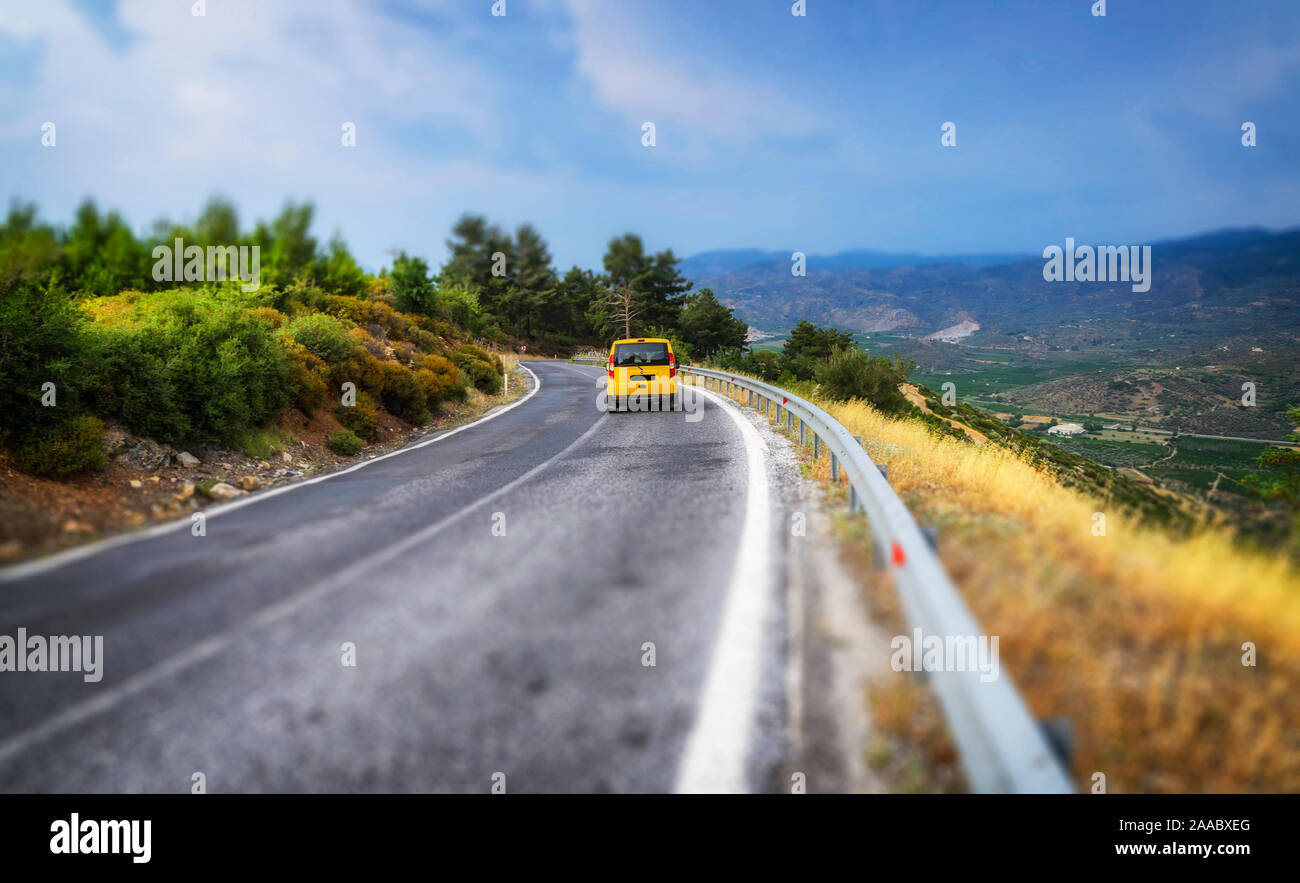 Road and yellow car top view with tilt shift effect Stock Photo - Alamy