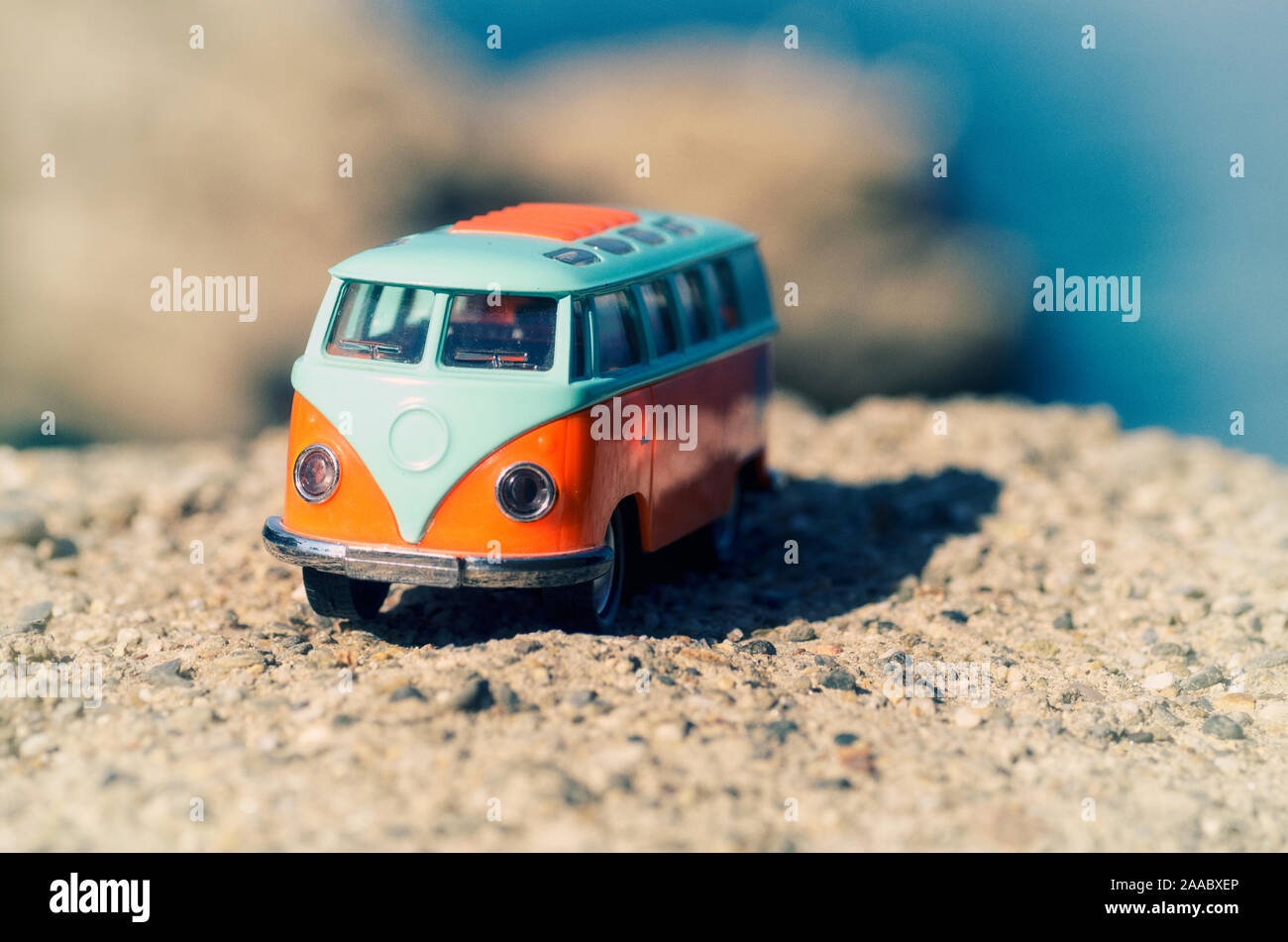 Vintage miniature orange and blue van. Travel concept Stock Photo - Alamy