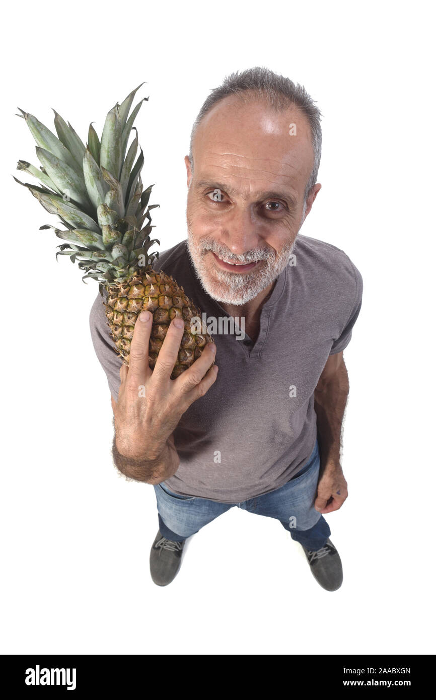 man with pineapple on white background Stock Photo - Alamy