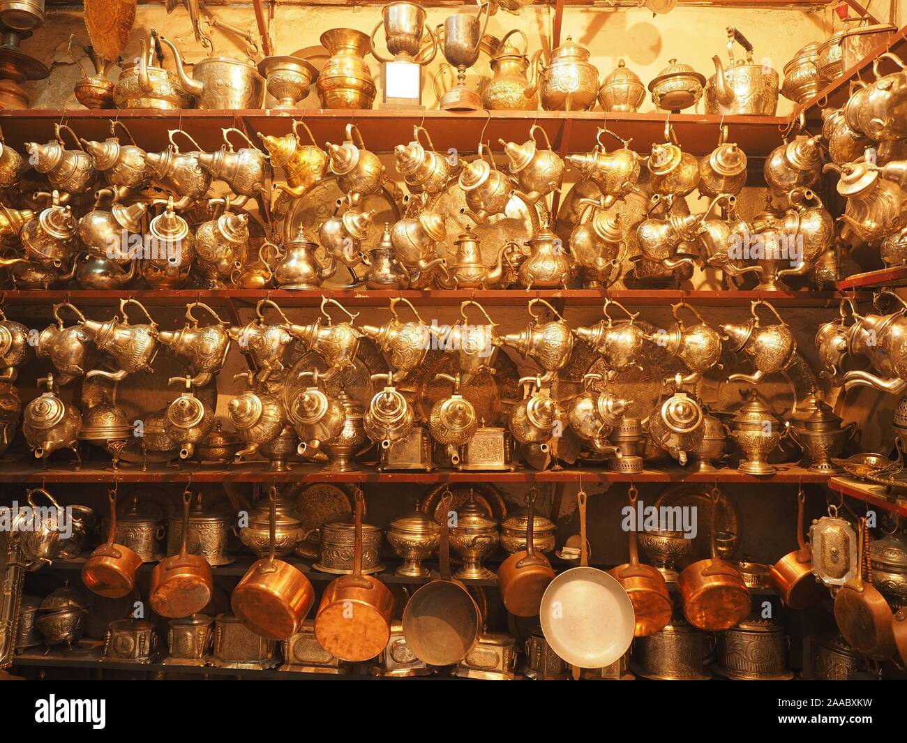 Shop with traditional silver and brass crockery, teapots and pots, souk ...
