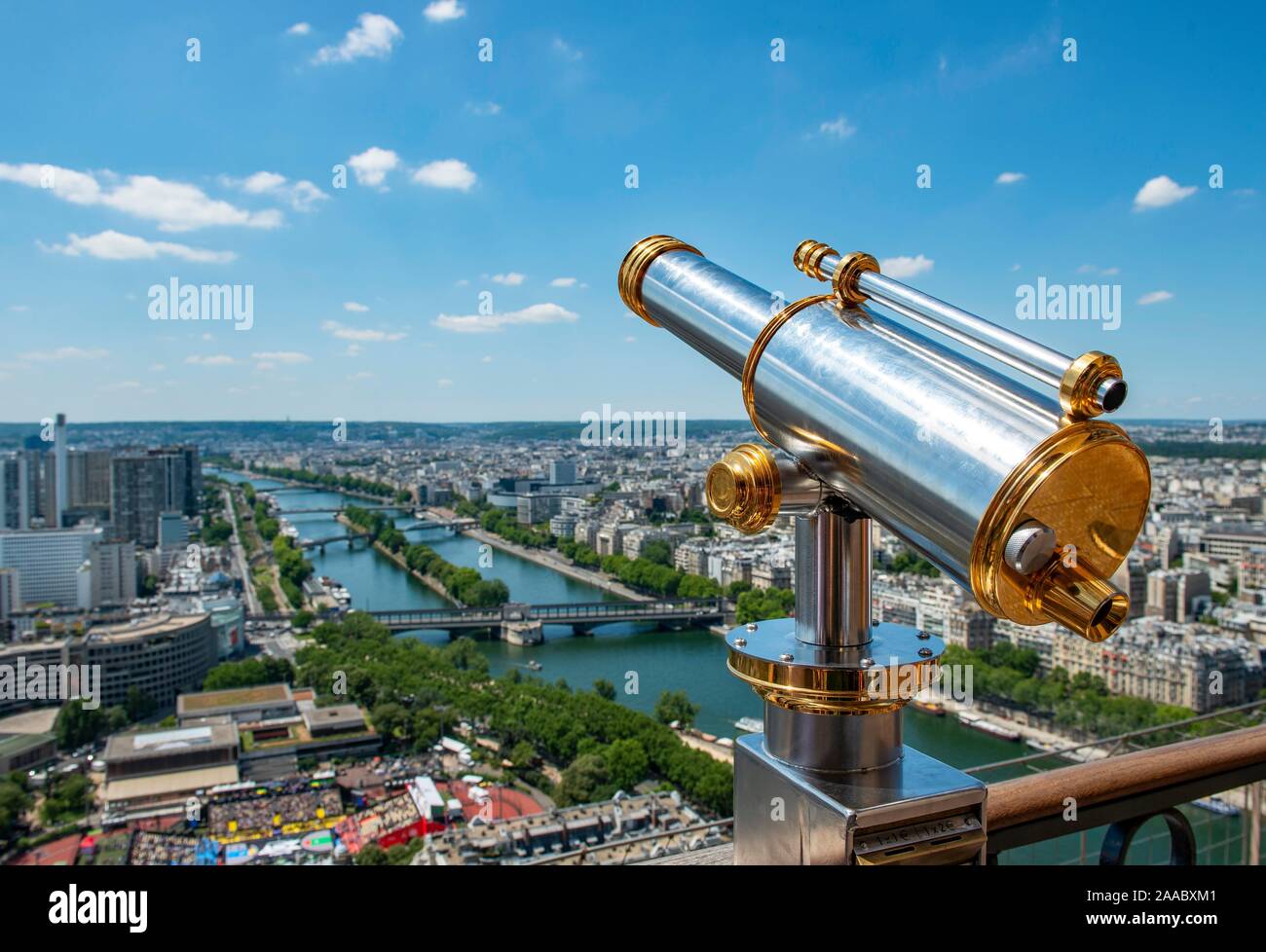 Telescope on the Eiffel Tower, view of the city with river Seine, Paris ...