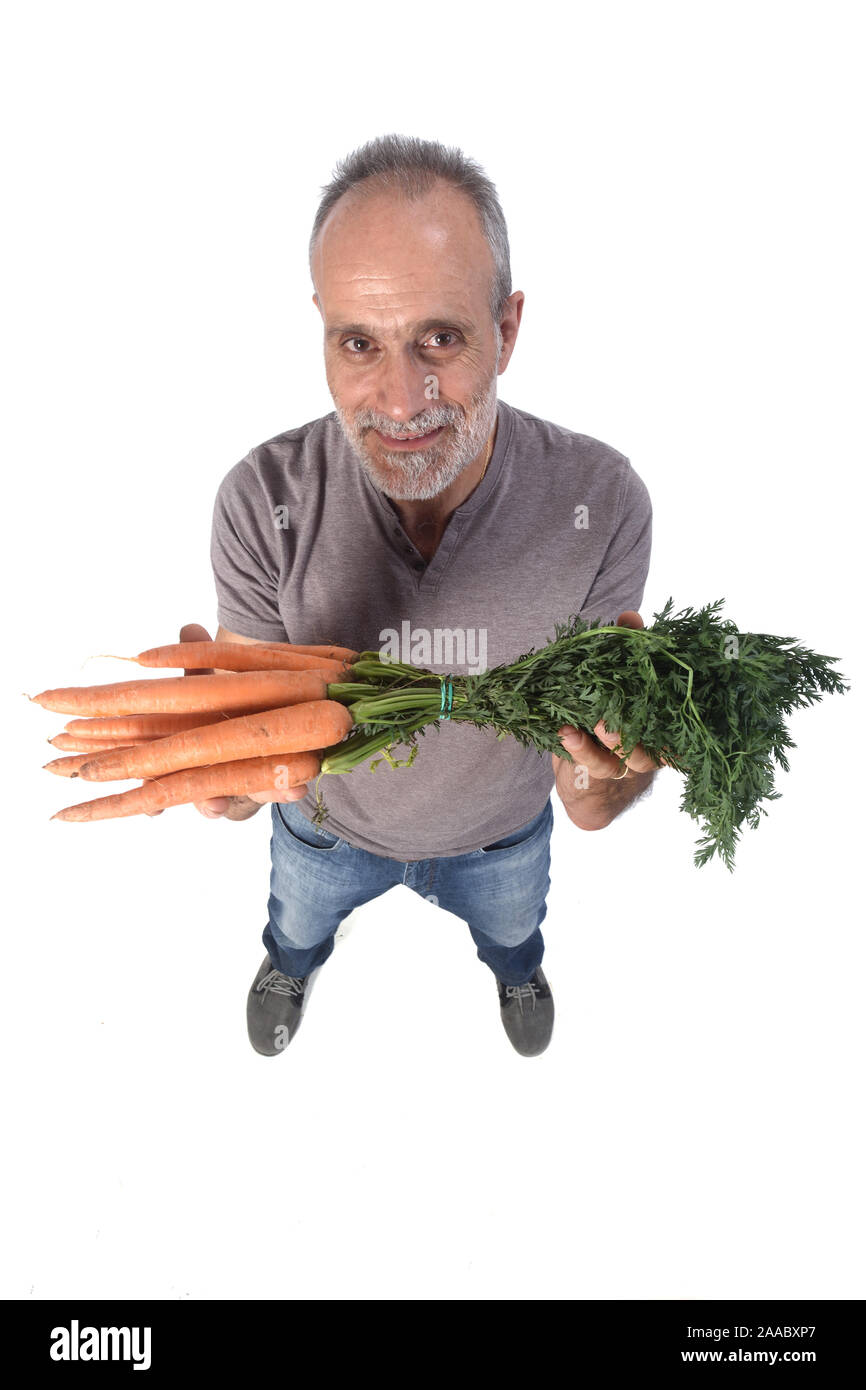 portrait of a man with carrot on white background Stock Photo - Alamy