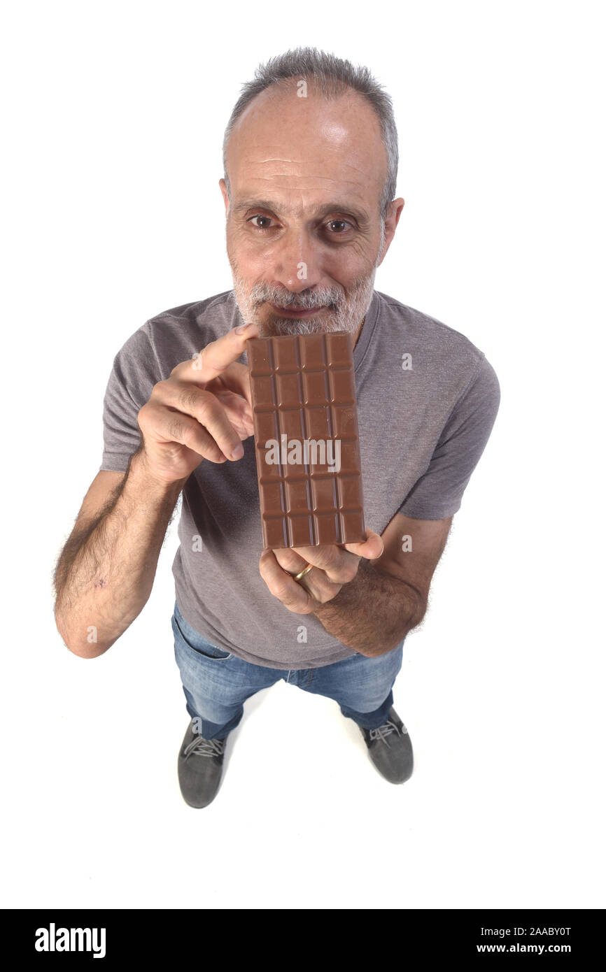 Man eating chocolate bar and happy hi-res stock photography and images ...