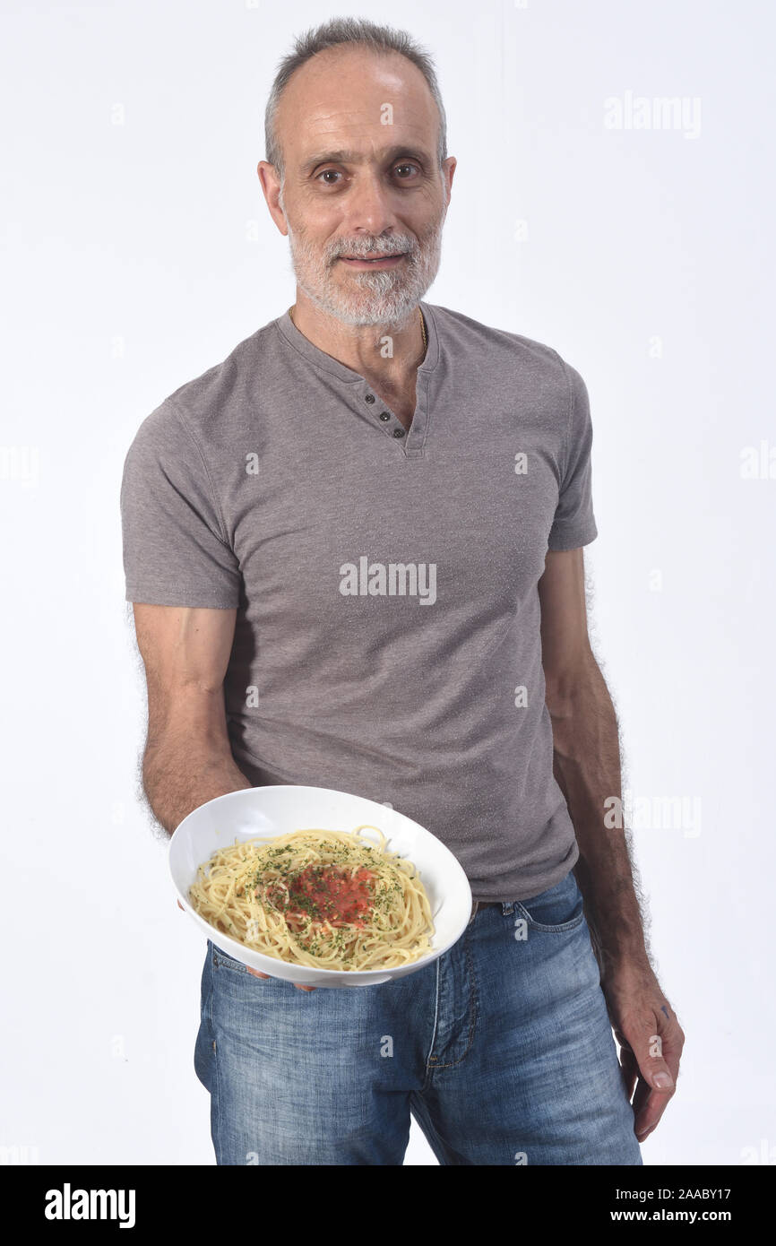 Old man eating spaghetti hi-res stock photography and images - Alamy