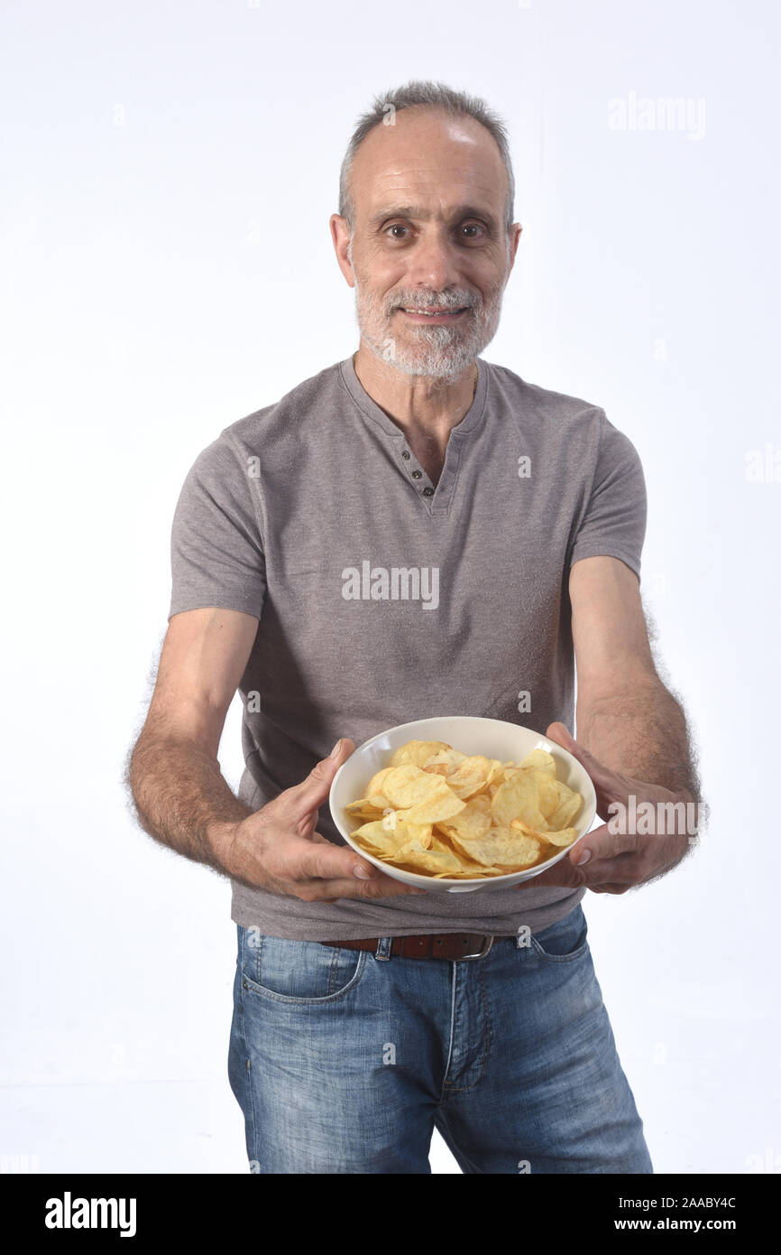 man with snacks on white background Stock Photo - Alamy