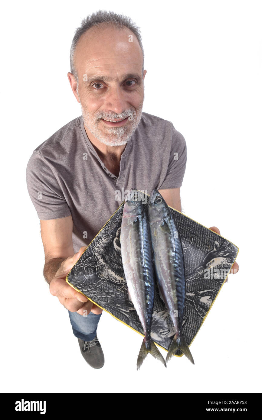 man with mackerel on white background Stock Photo - Alamy