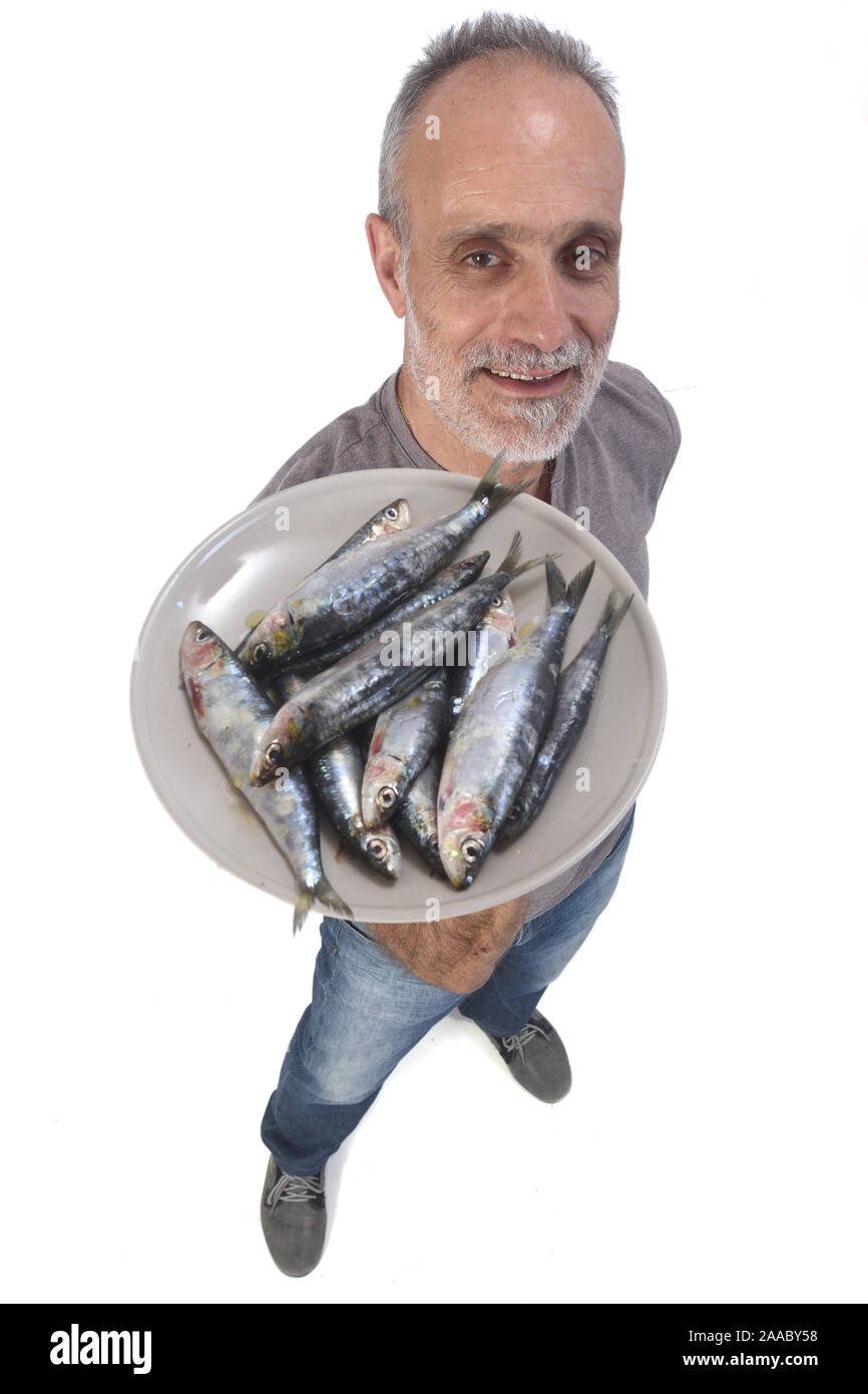 man with sardine on white background Stock Photo - Alamy