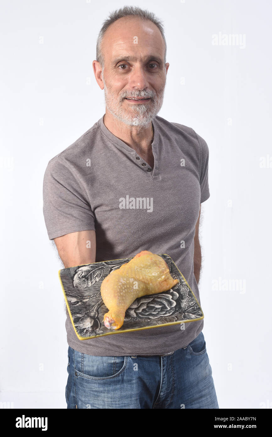Attractive man and chicken hi-res stock photography and images - Alamy