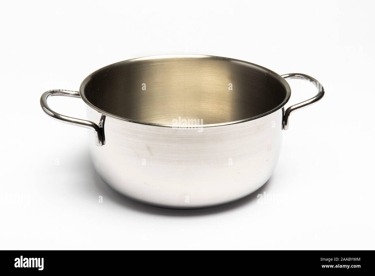 A metal cooker on a white background Stock Photo - Alamy