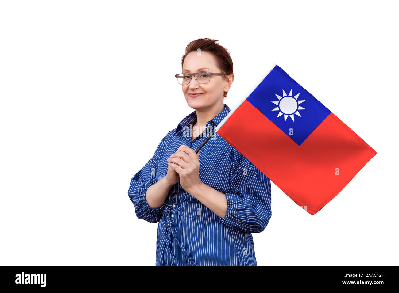 Taiwan flag. Woman holding Taiwan flag. Nice portrait of middle aged ...