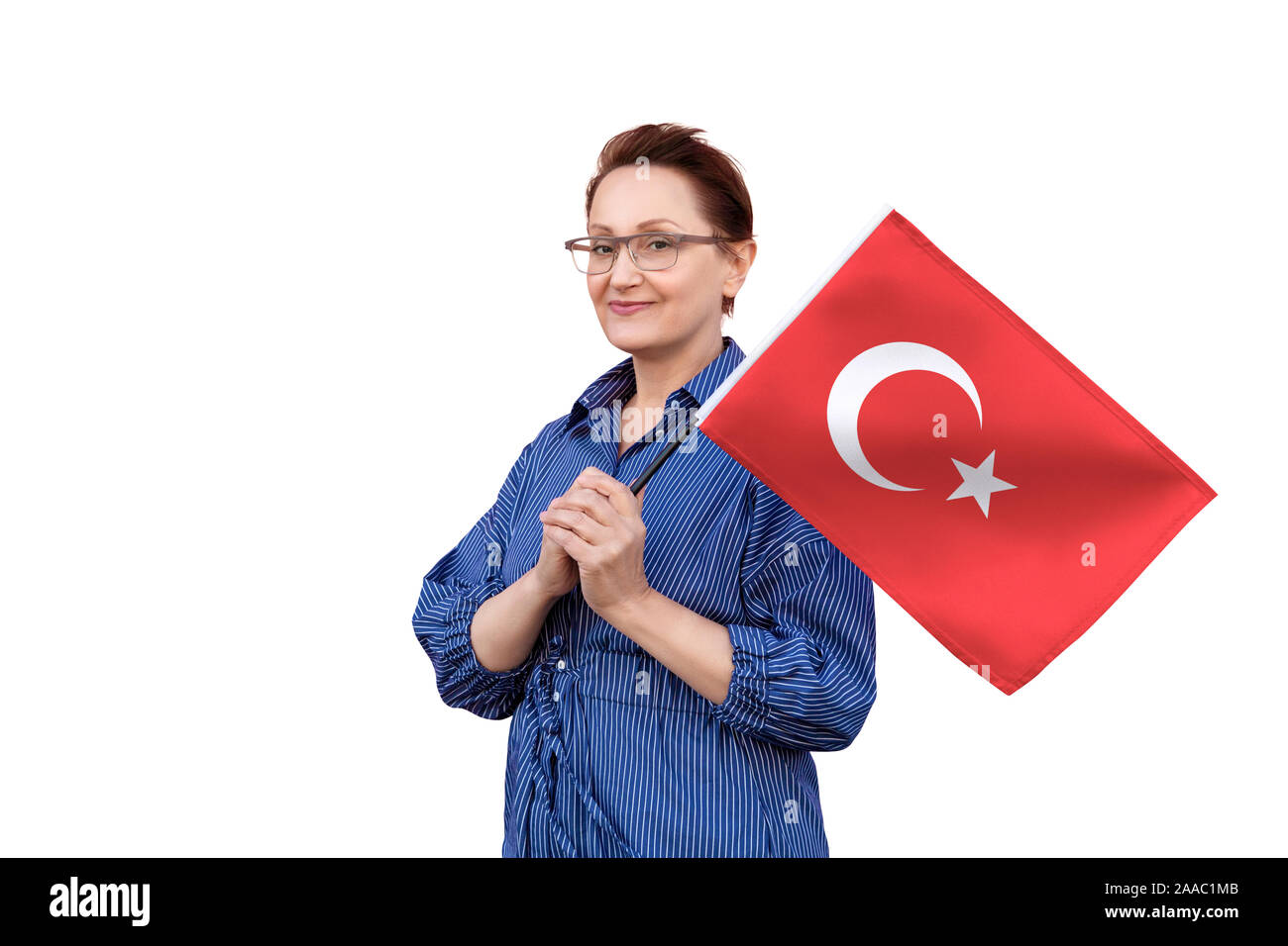 Turkey flag. Woman holding Turkish flag. Nice portrait of middle aged ...