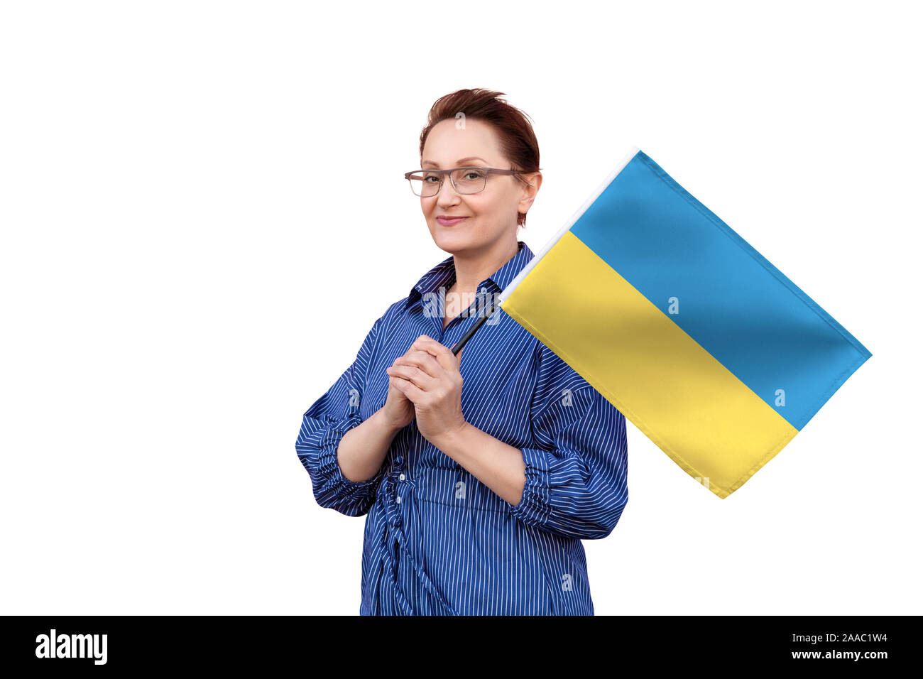 Ukraine flag. Woman holding Ukraine flag. Nice portrait of middle aged ...